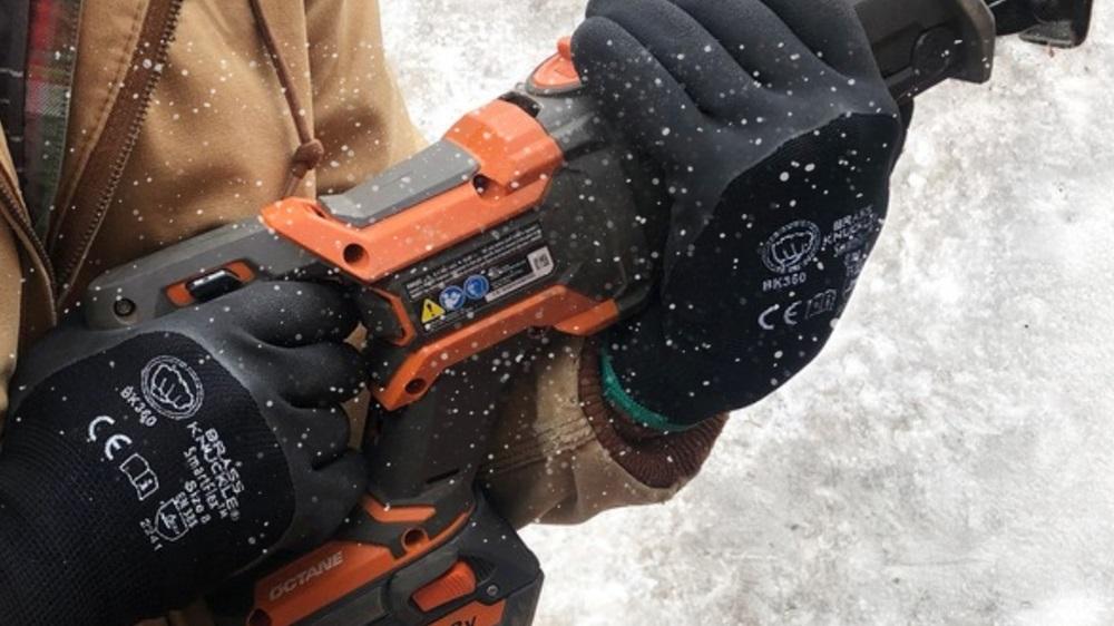 Work gloves keep cold out with layered protection